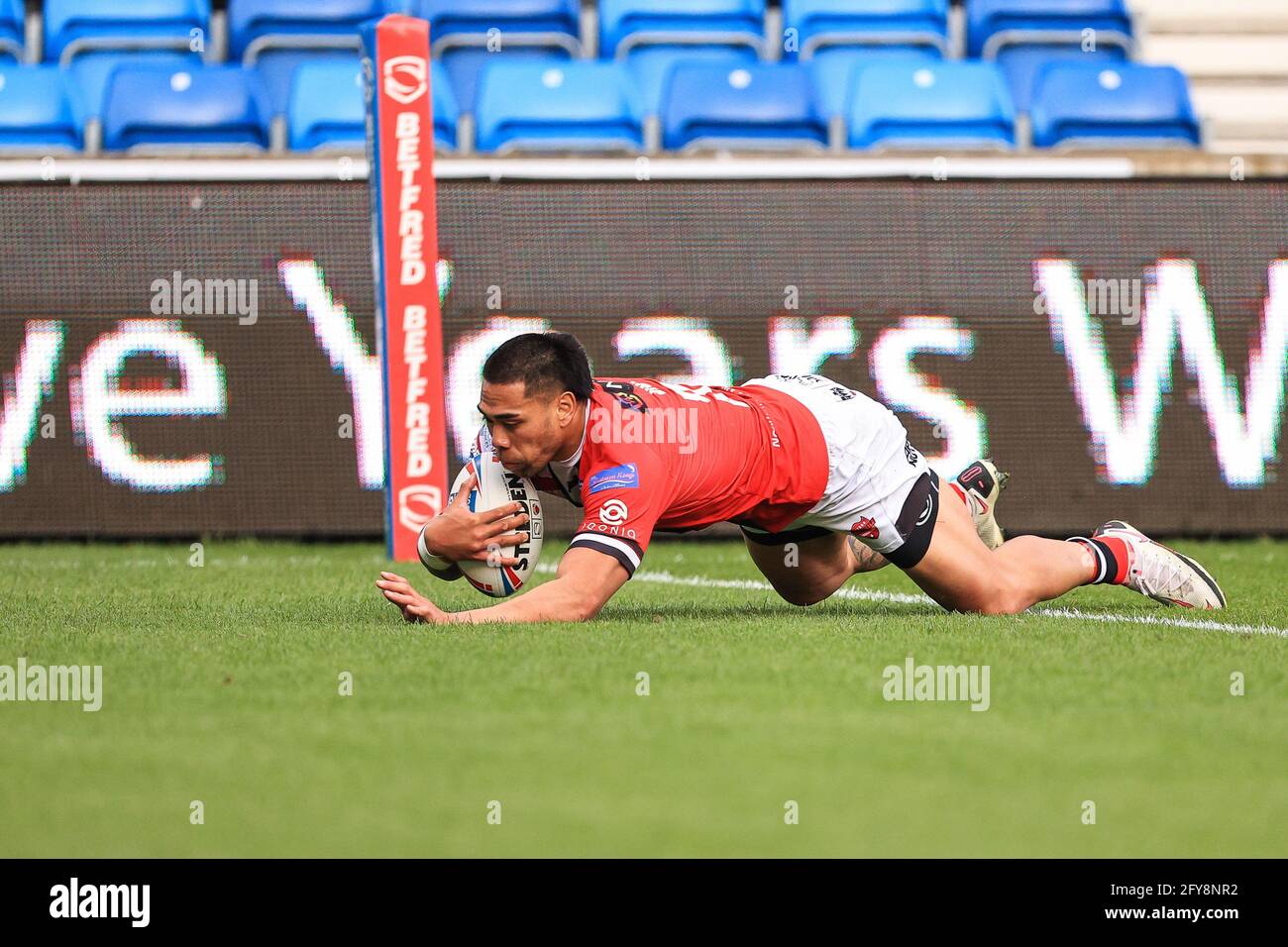Ken Sio (2) of Salford Red Devils goes over for a try in, on 5/27/2021 ...