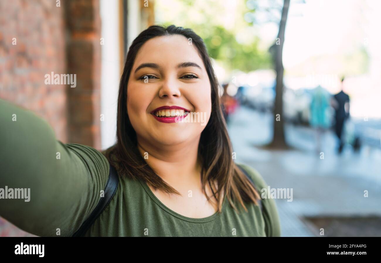 Happy plus size model hi-res stock photography and images - Alamy