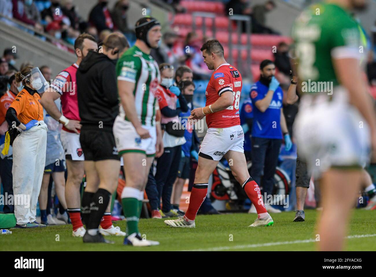 Darcy Lussick (28) of Salford Red Devils leaves the pitch after being ...