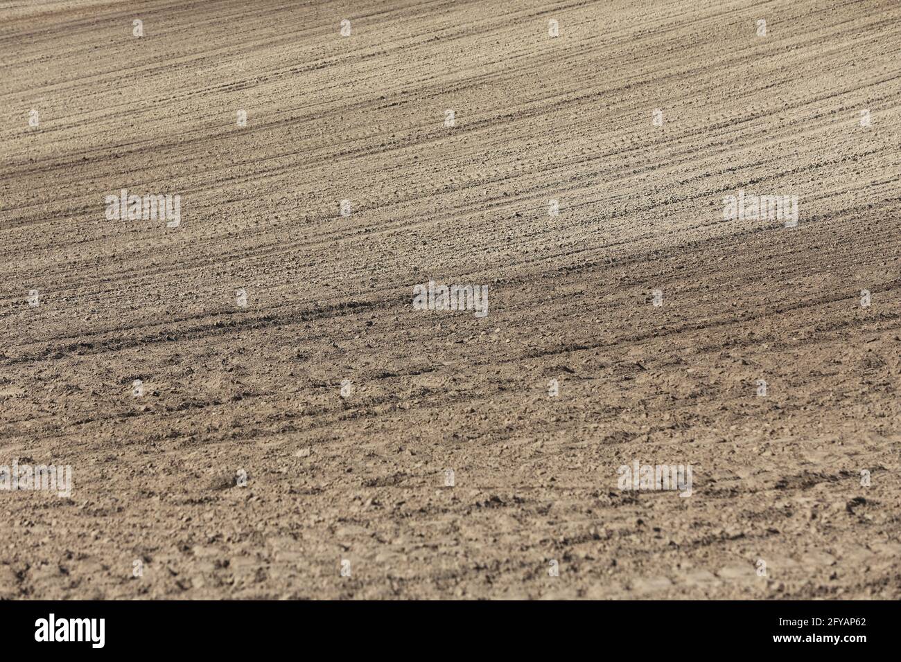 Landscape agricultural land in slope recently plowed for the crop Stock ...
