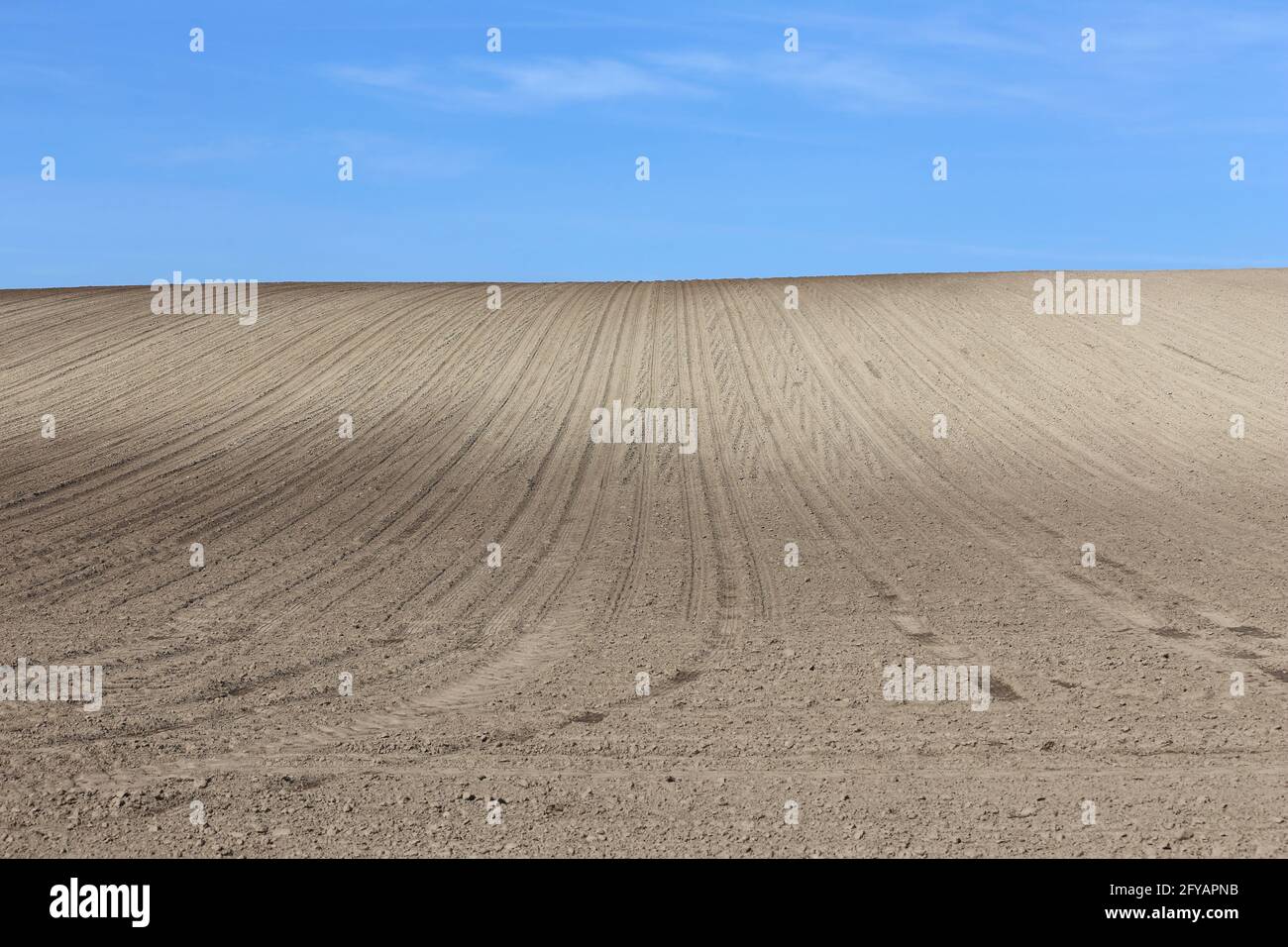 Landscape agricultural land in slope recently plowed for the crop Stock ...