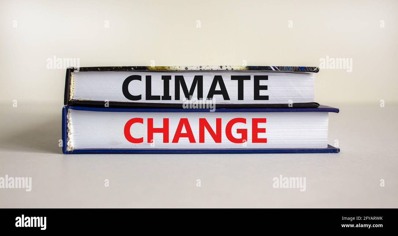 Climate change symbol. Books with words 'Climate change' on beautiful ...