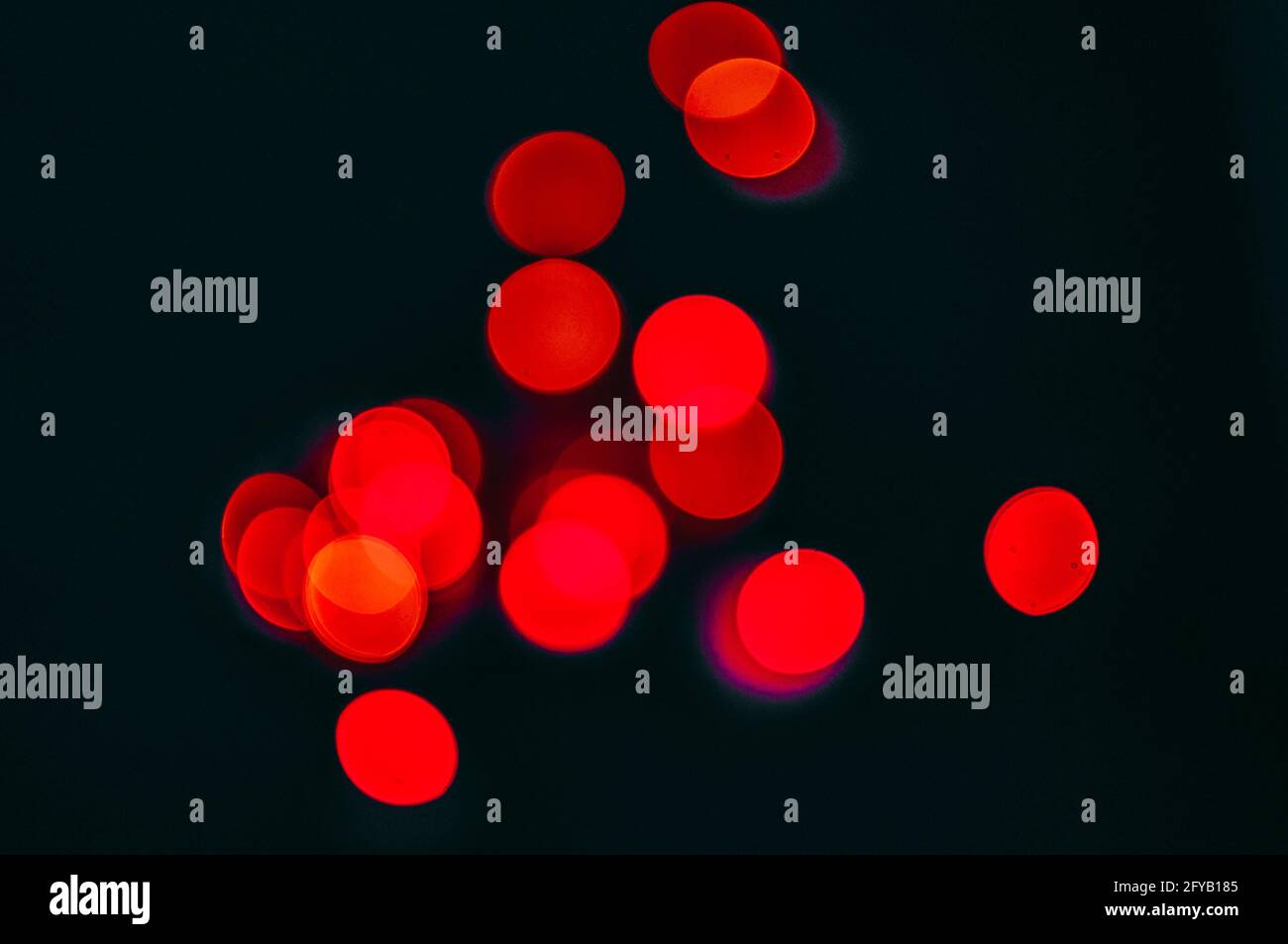 Dark blurry background with colorful bokeh lights - great for wallpapers and textures Stock ...