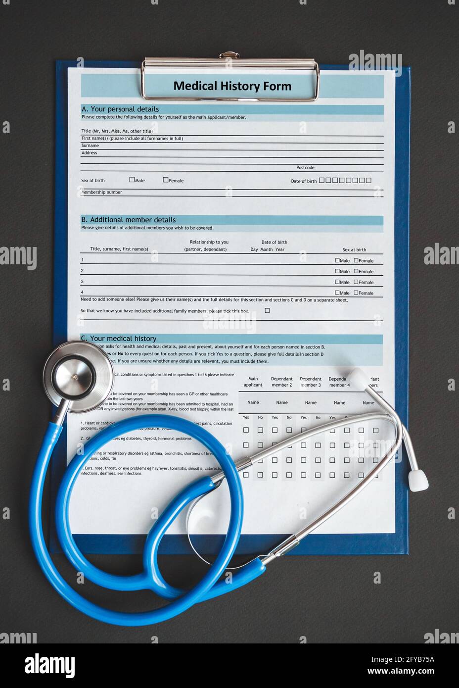 Patient medical history on a clipboard with stethoscope Stock Photo - Alamy