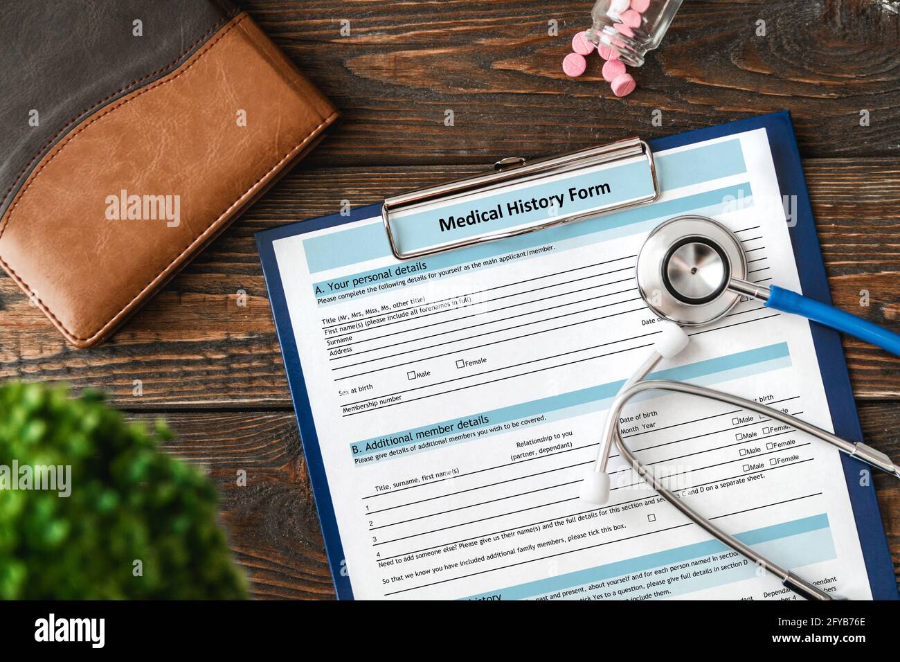 Patient medical history on a clipboard with stethoscope Stock Photo - Alamy