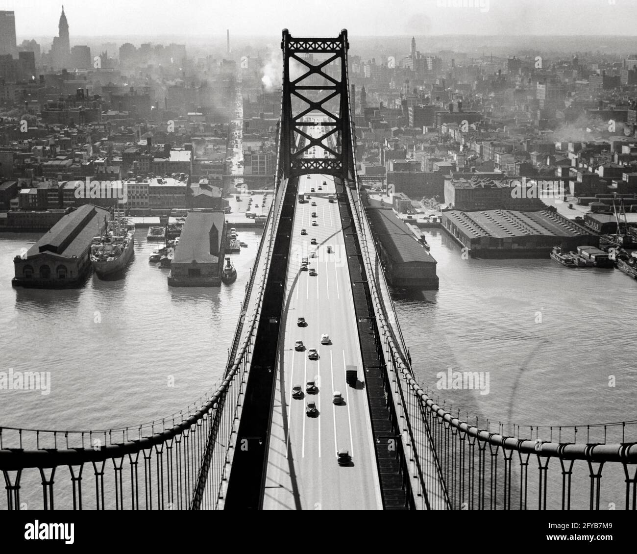 1940s 1950s BENJAMIN FRANKLIN BRIDGE 1926 BY RALPH MODJESKI VIEW OVER THE DELAWARE RIVER FROM ...