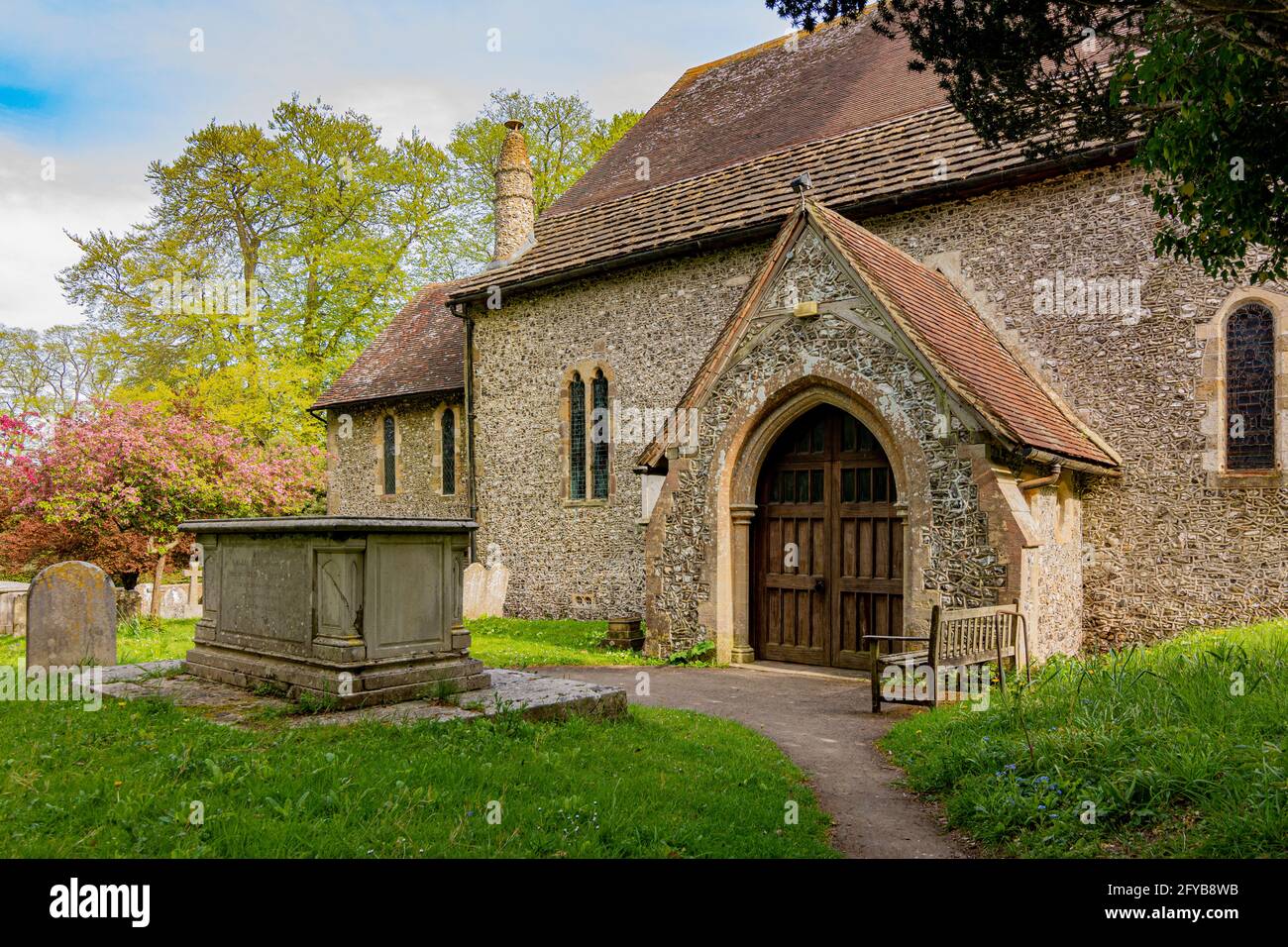 The entrance to the St. John the Baptist village church, Findon, West ...