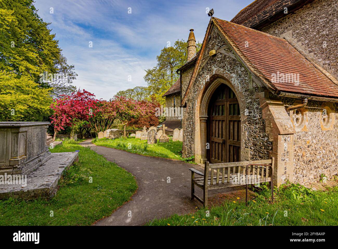 The entrance to the St. John the Baptist village church, Findon, West ...