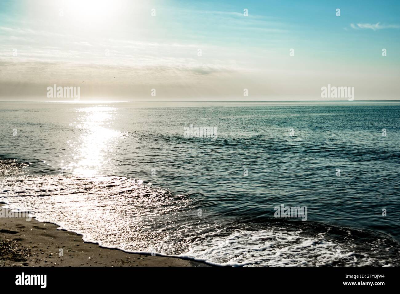 Early morning. Sunrise over the sea. Glitter on the water. Sunny path ...