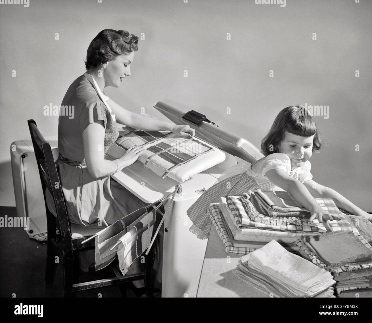 Woman ironing 1950's hi-res stock photography and images - Alamy