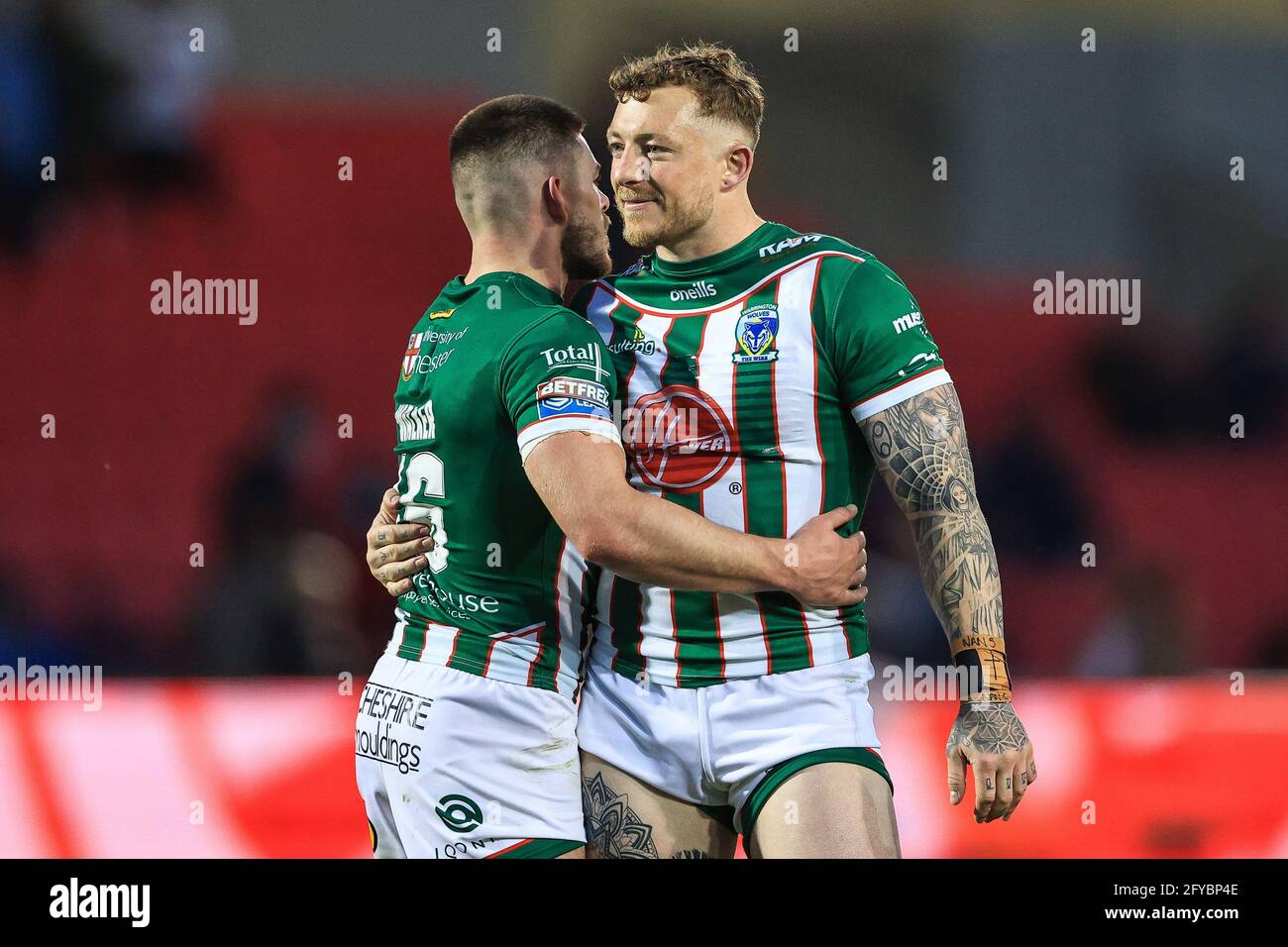 Josh Charnley (5) and Danny Walker (16) of Warrington Wolves celebrate ...