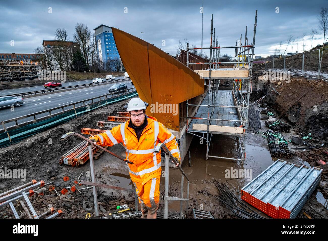 Construction workers in action on construction site Stock Photo - Alamy