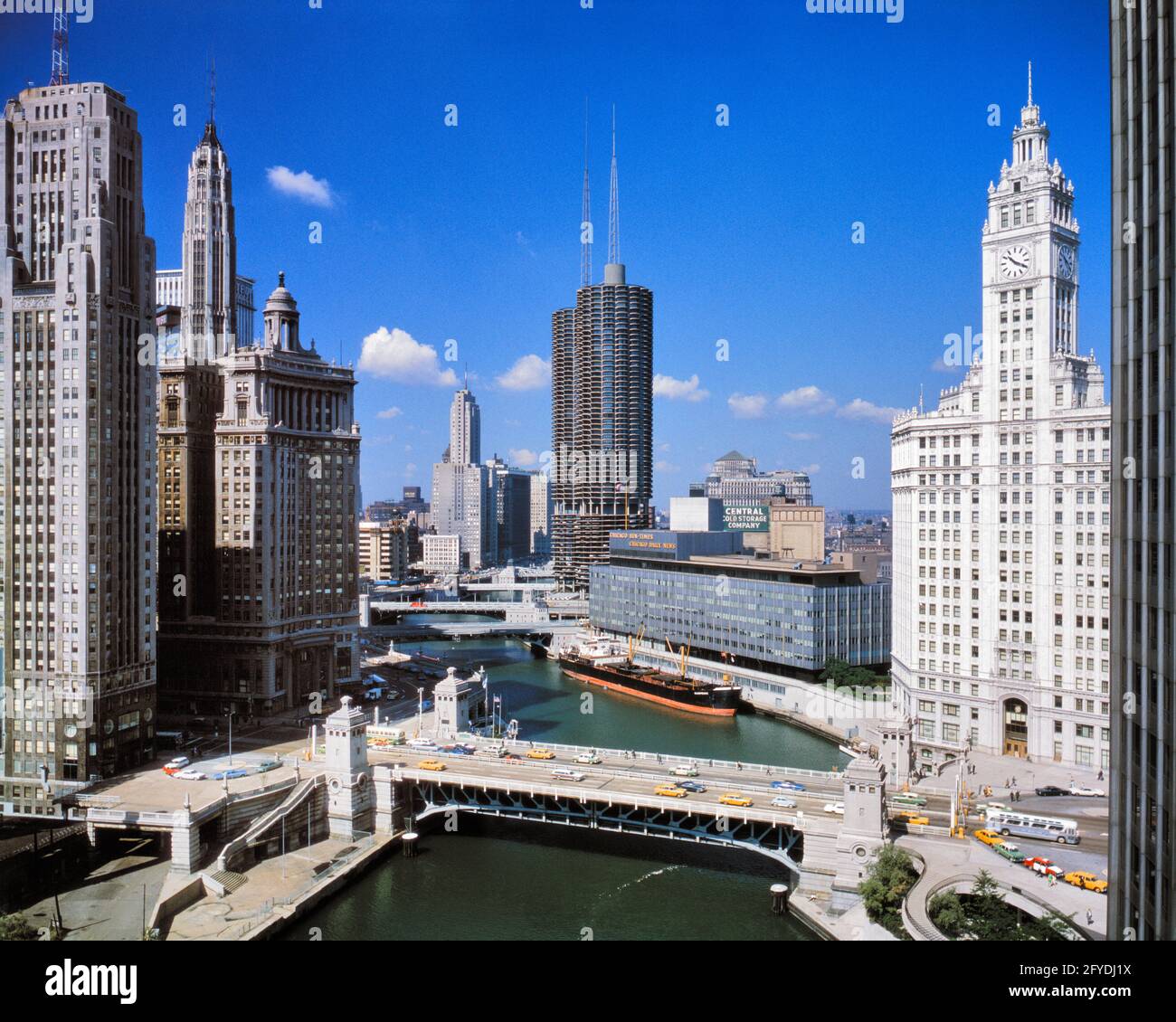 1960s SKYLINE ALONG THE CHICAGO RIVER MICHIGAN AVENUE IN FOREGROUND ...