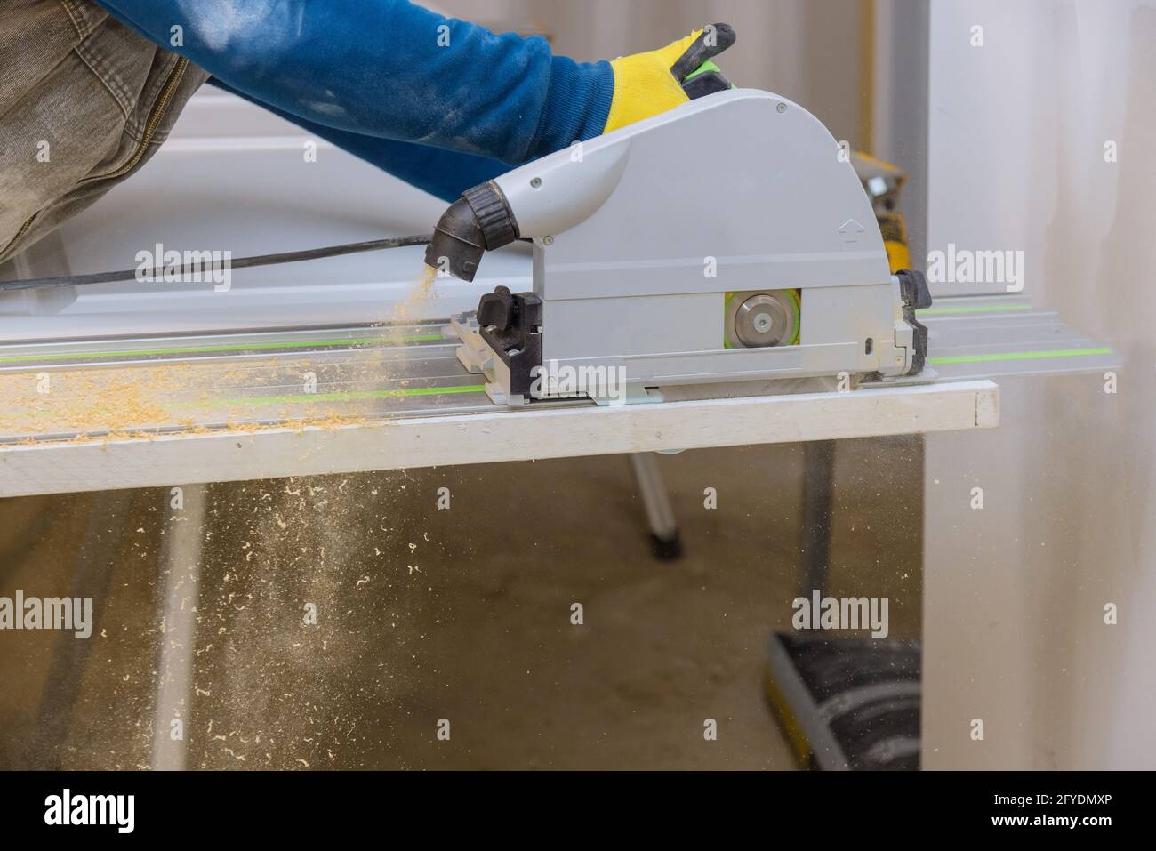 Hand with saw hi-res stock photography and images - Alamy
