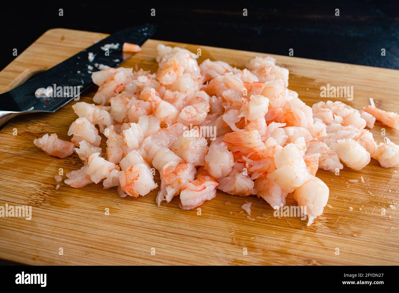Roughly Chopped Cooked Shrimp: Peeled shrimp that has been coarsely ...