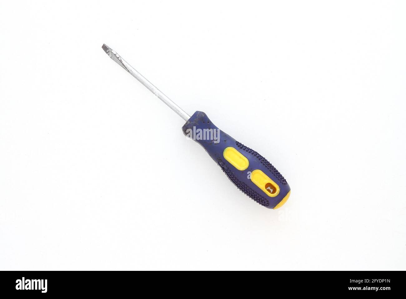 Screwdriver with rubber handle on white background Stock Photo - Alamy