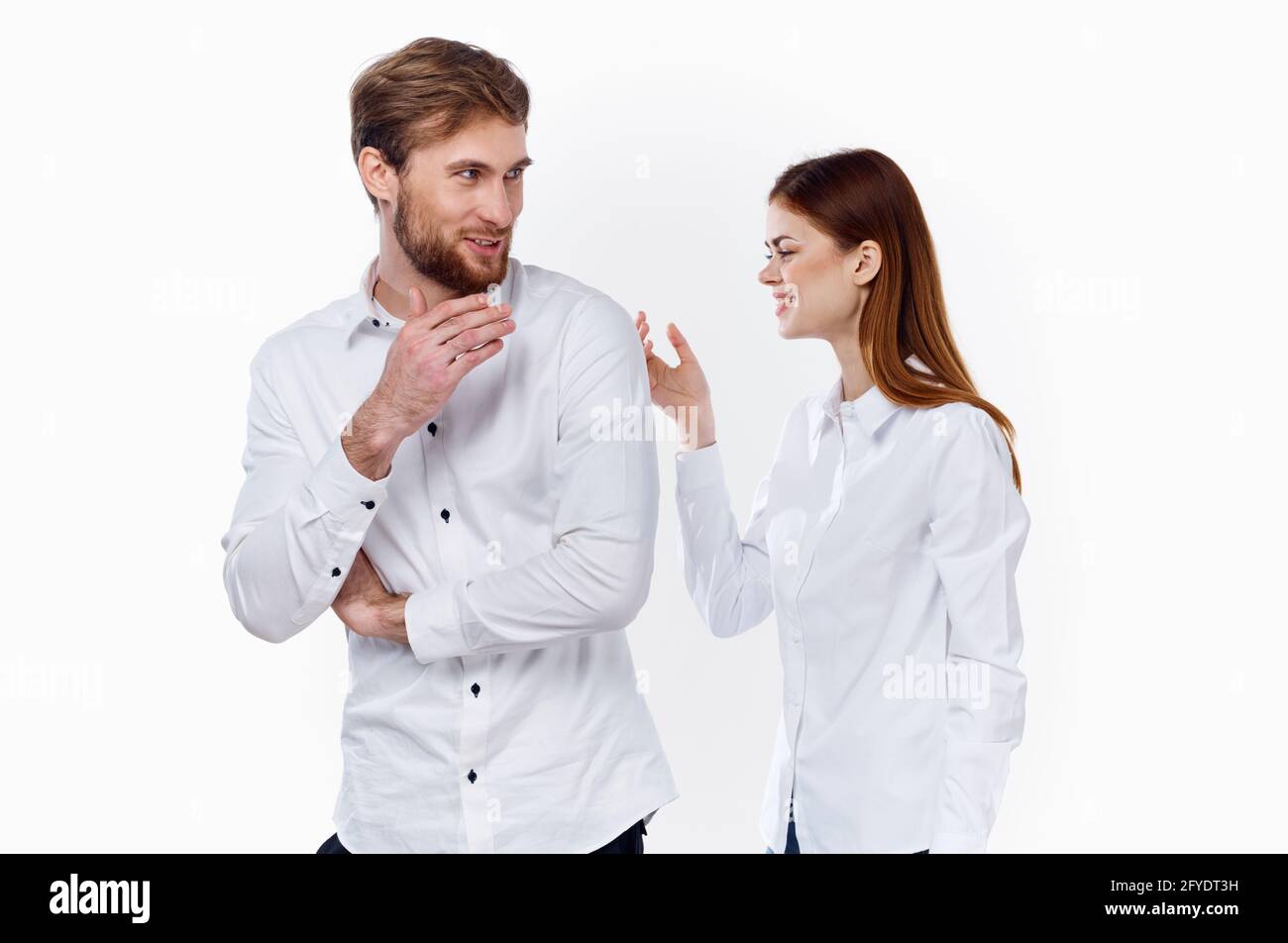 Looks at a colleague Cut Out Stock Images & Pictures - Alamy