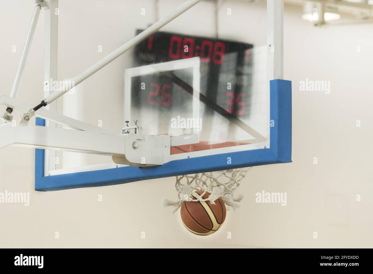 Ball has fallen into a ring net on a basketball backboard Stock Photo ...