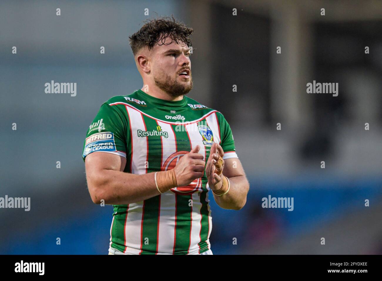 Joe Philbin (13) of Warrington Wolves in action during the game Stock ...