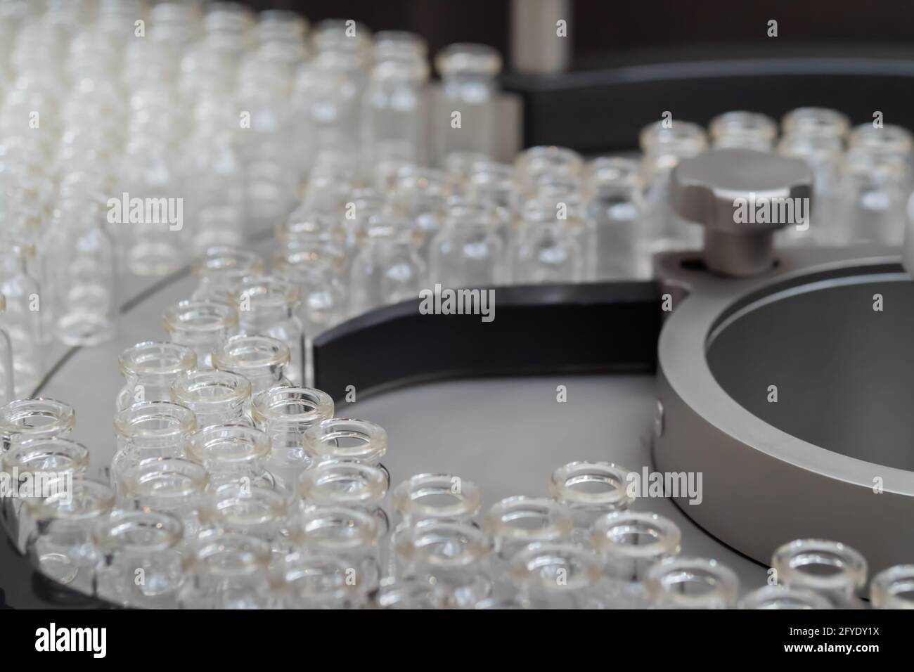 Pharmaceutical production line - conveyor belt with empty injection ...