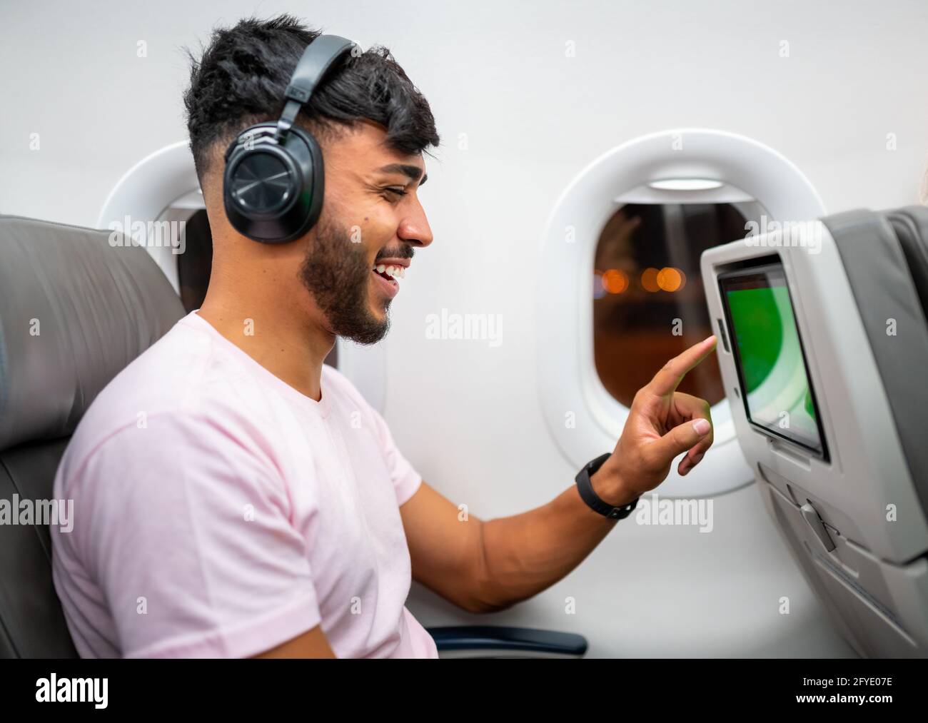Passenger using touch screen monitor hi-res stock photography and ...