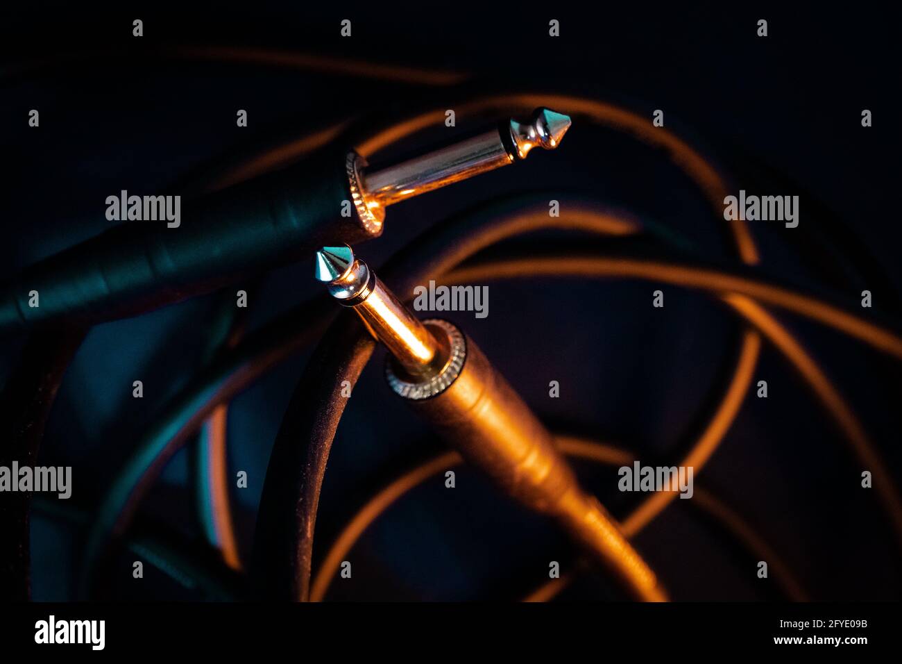 Closeup of Jack Connectors on Quarter Inch Cord in Front of Tangled ...