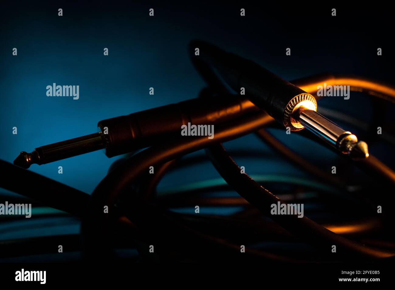 Closeup of Quarter Inch Jack Connector Laying on Top of Tangled Cord on ...