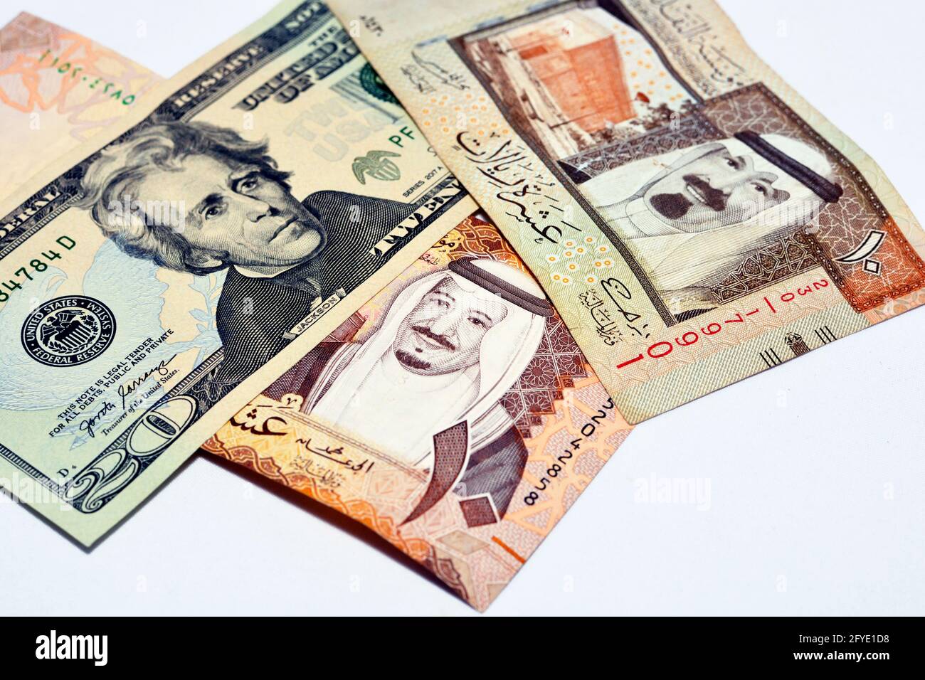American 20 dollars with Saudi Arabia riyals currency banknotes of 10 ...