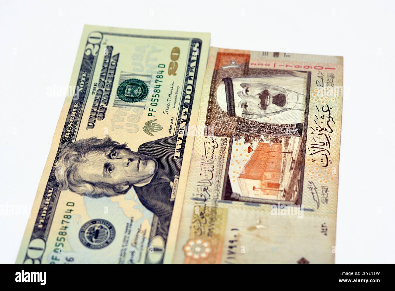American 20 dollars with Saudi Arabia riyals currency banknotes of 10 ...