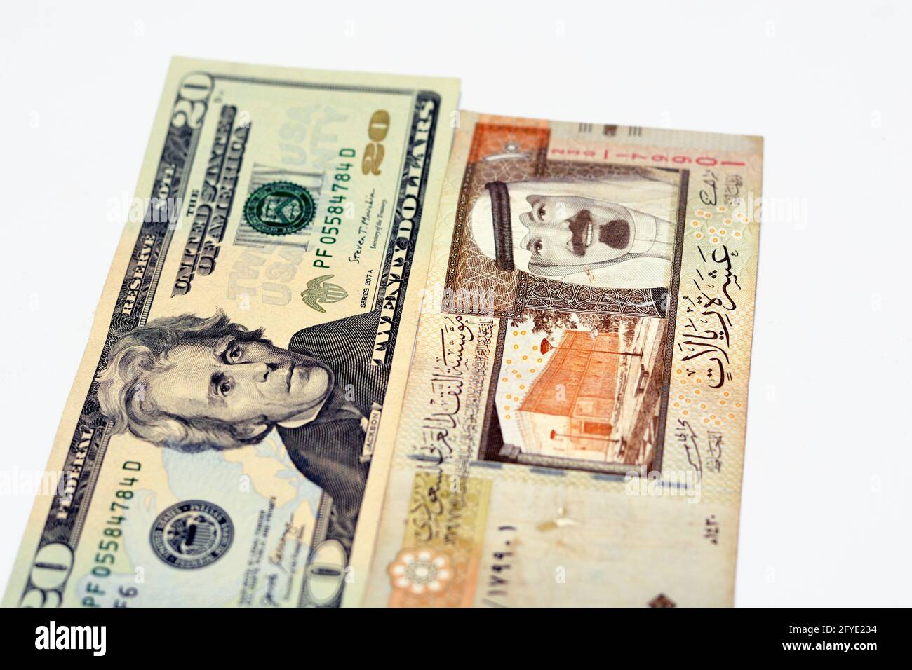 American 20 dollars with Saudi Arabia riyals currency banknotes of 10 ...
