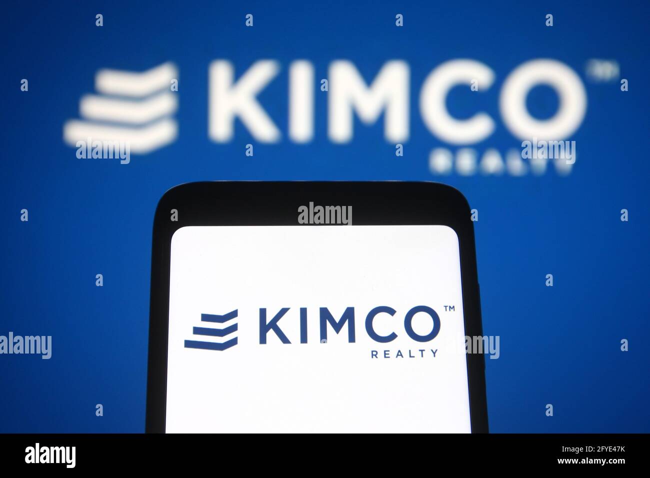 In this photo illustration, a Kimco Realty Corporation logo of a real ...