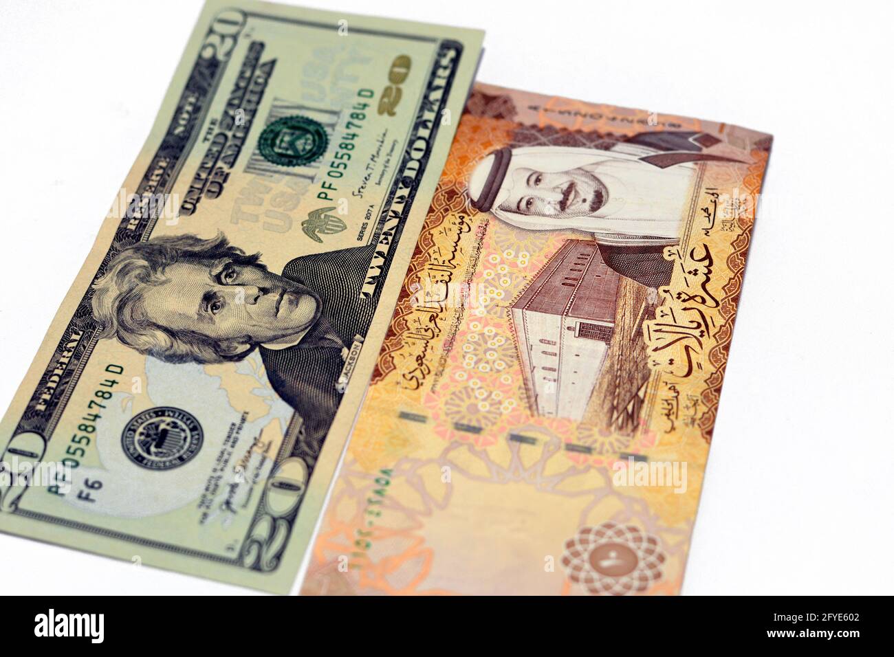 American 20 dollars with Saudi Arabia riyals currency banknotes of 10 ...