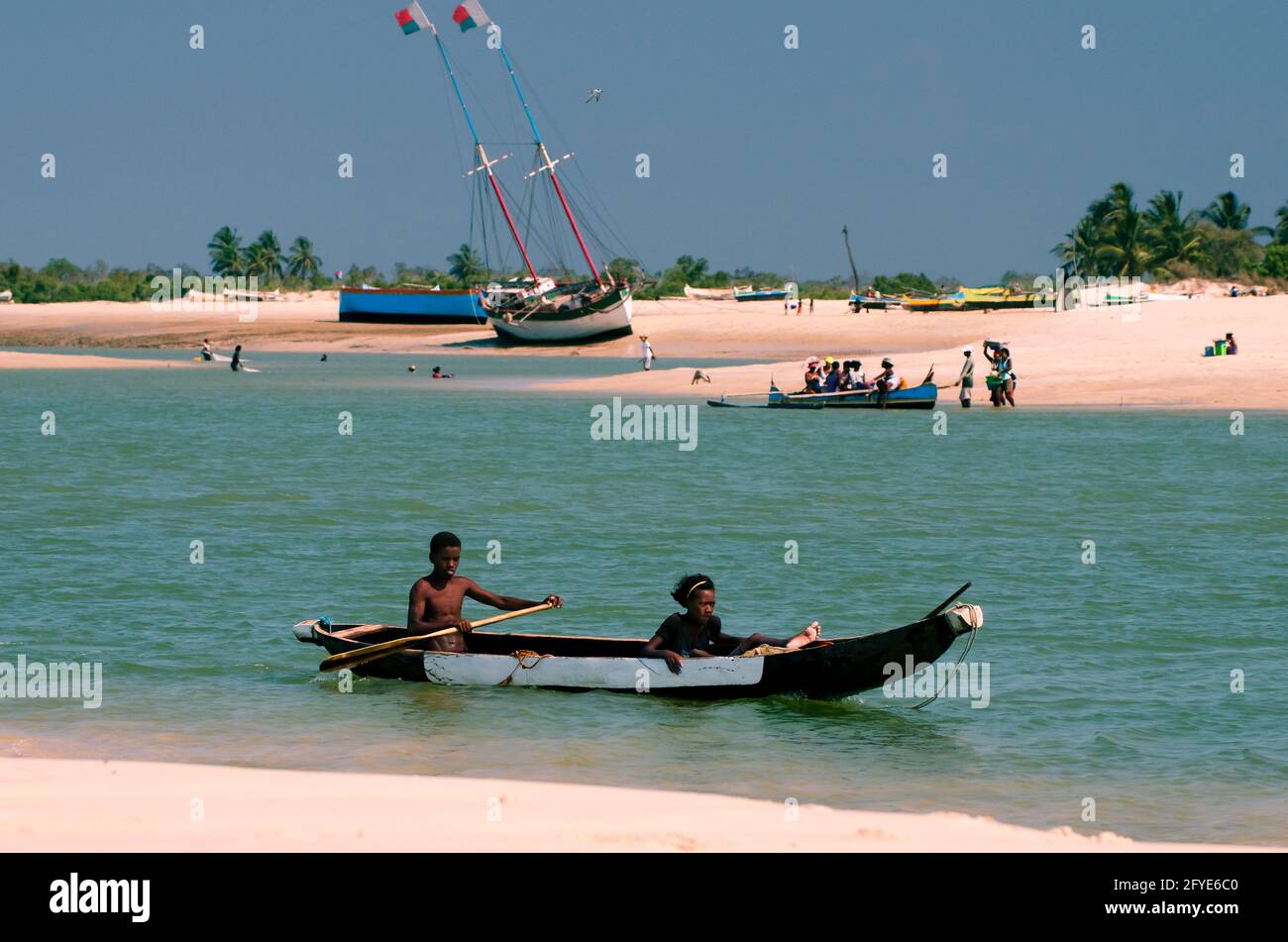 Couple in dugout canoe, Morondava, Madagascar Stock Photo - Alamy