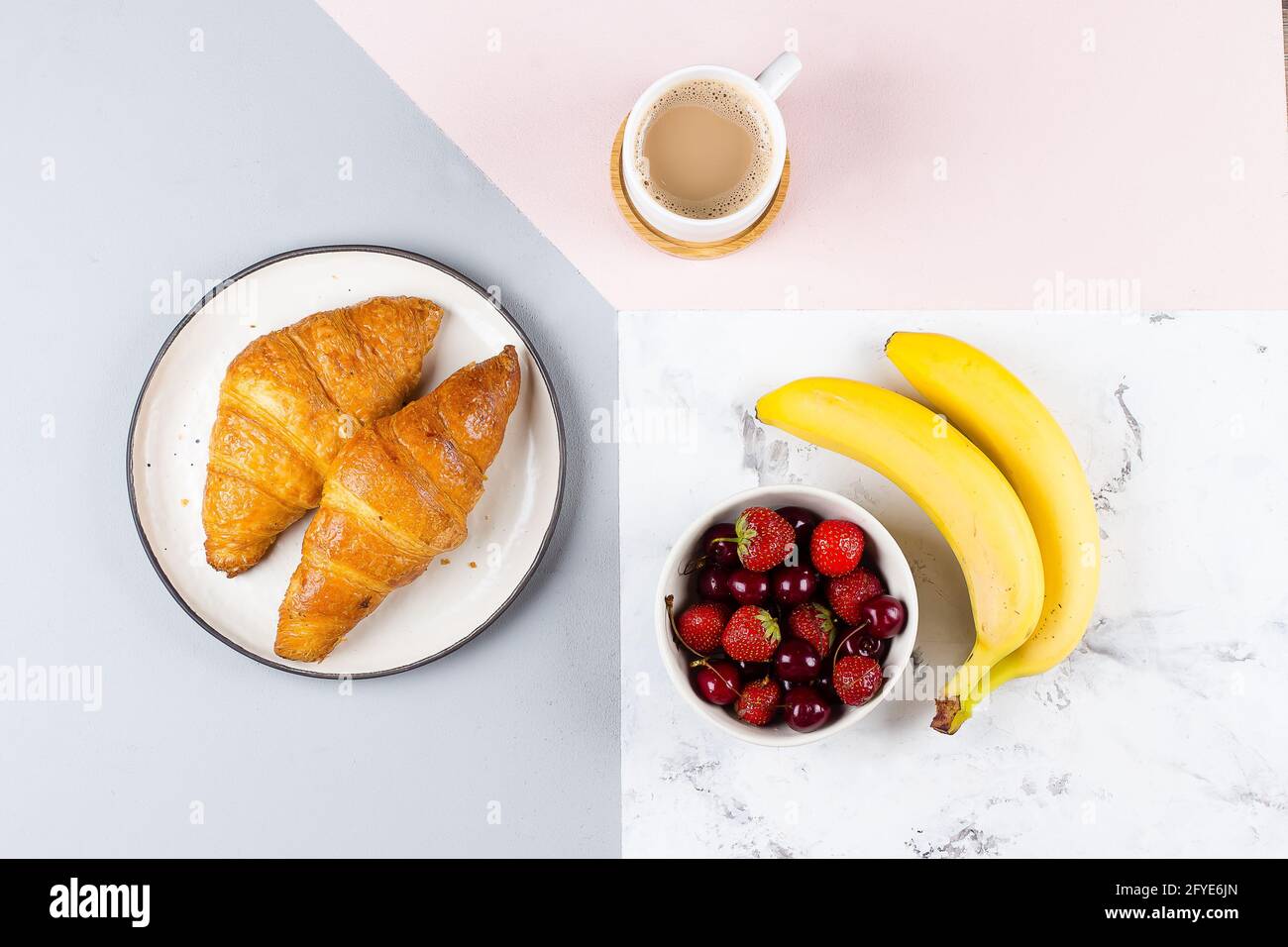 Breakfast Flat Lay with coffee, croissants and berries for breakfast on ...