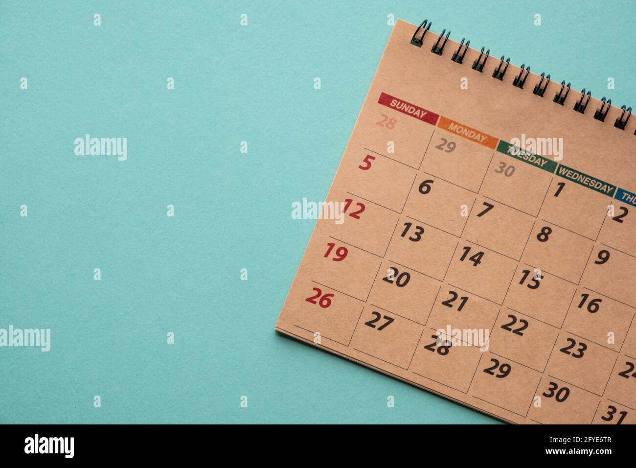 Close up of calendar on green background, planning for business meeting ...