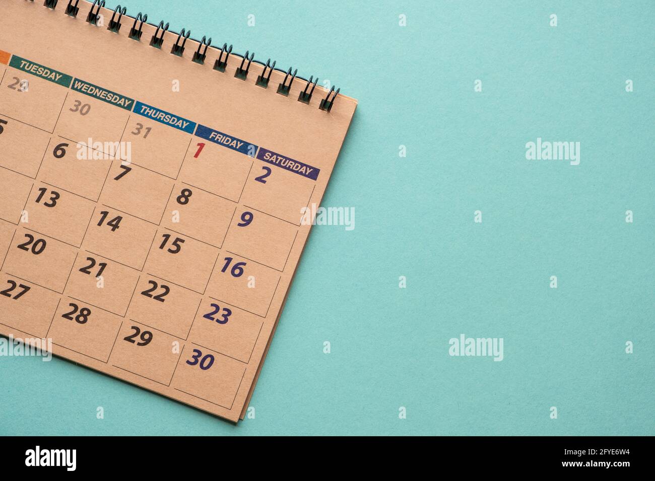 Close up of calendar on green background, planning for business meeting ...