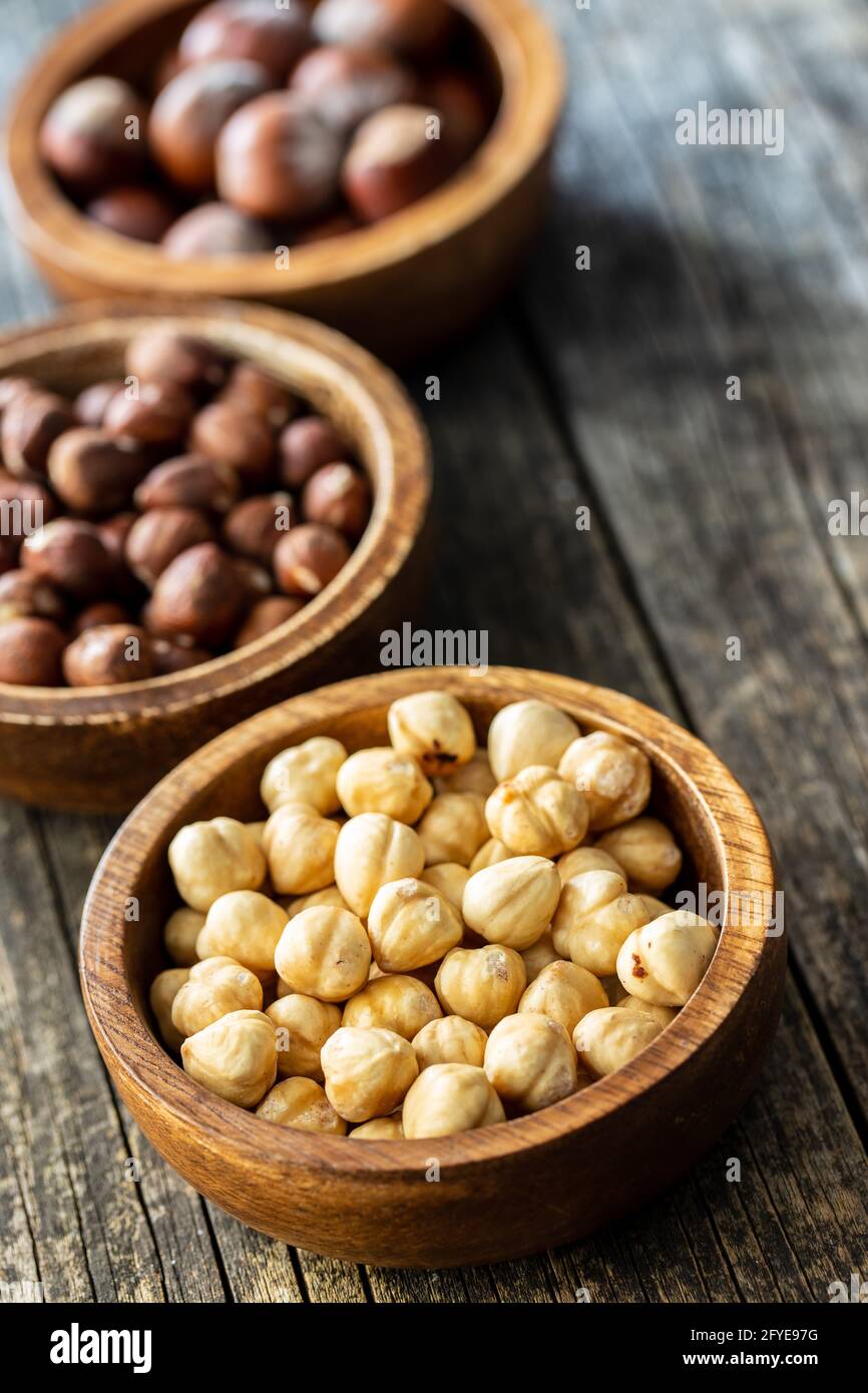 Peeled roasted hazelnut kernels in bowl Stock Photo - Alamy