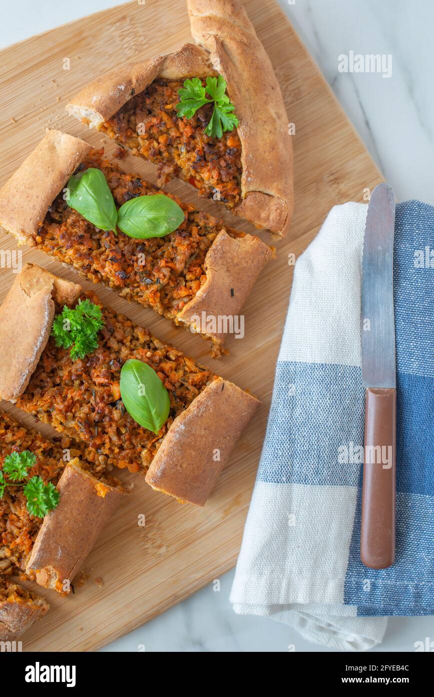 Traditional Turkish flatbreads known as kasarli sucuklu pide Stock ...