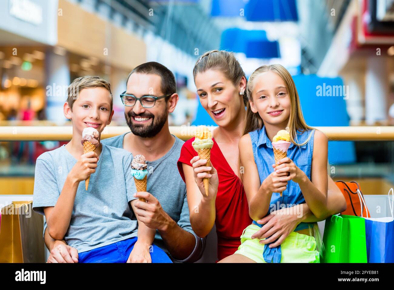 Man and boy eating ice cream hi-res stock photography and images - Alamy