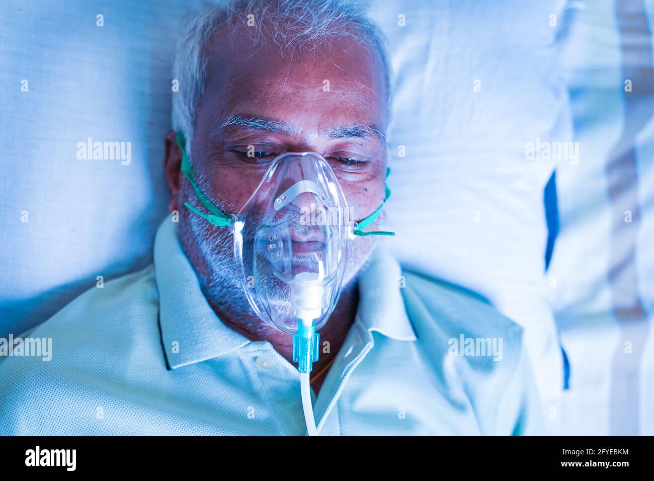 Close up Top view head shot of old breathing with ventilator oxygen ...