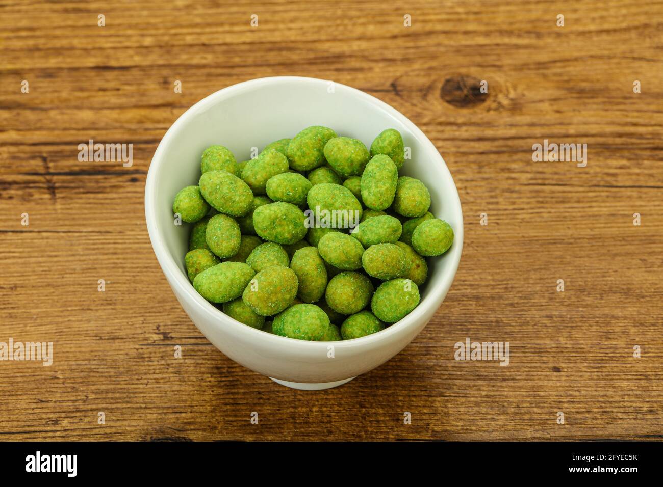Spicy wasabi peanuts snack in the bowl Stock Photo - Alamy