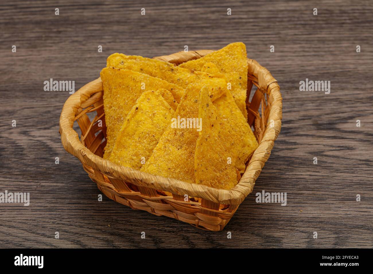 Mexican crunchy corn nachos triangle heap Stock Photo - Alamy