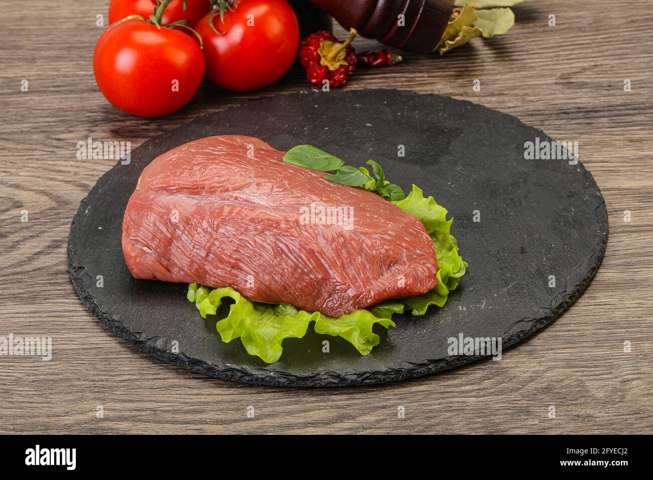 Raw beef meat piece for cooking Stock Photo - Alamy