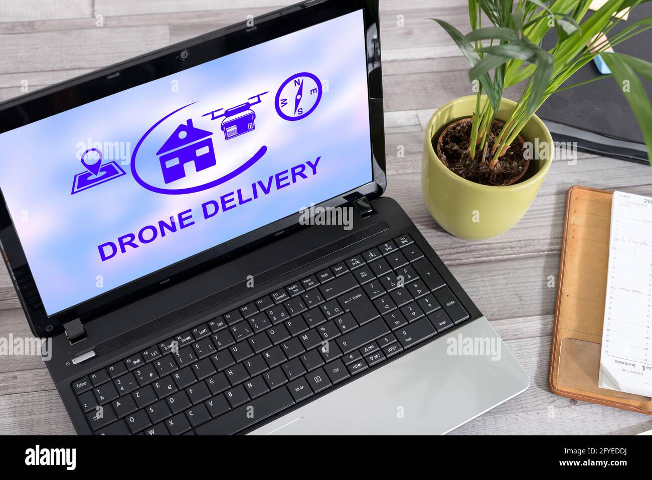 Laptop screen with drone delivery concept Stock Photo - Alamy
