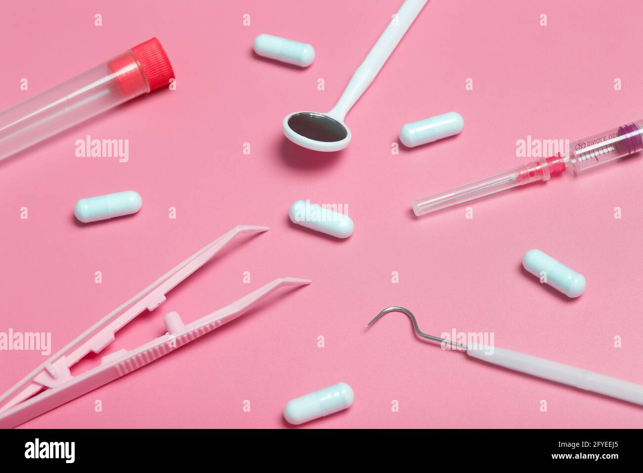 Medical instruments, devices and items on the colored table in the ...
