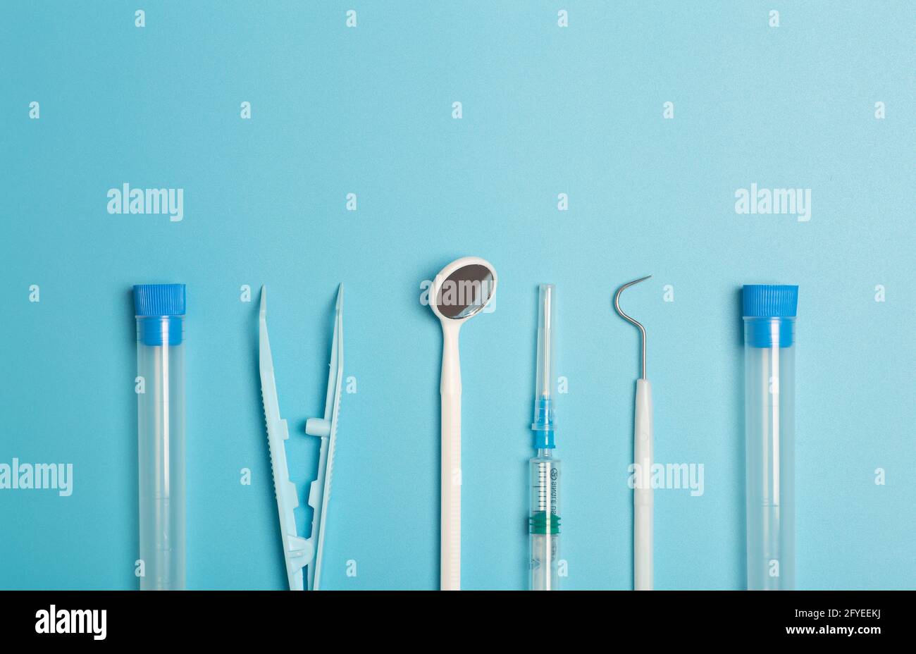 Medical instruments, devices and items on the colored table in the ...