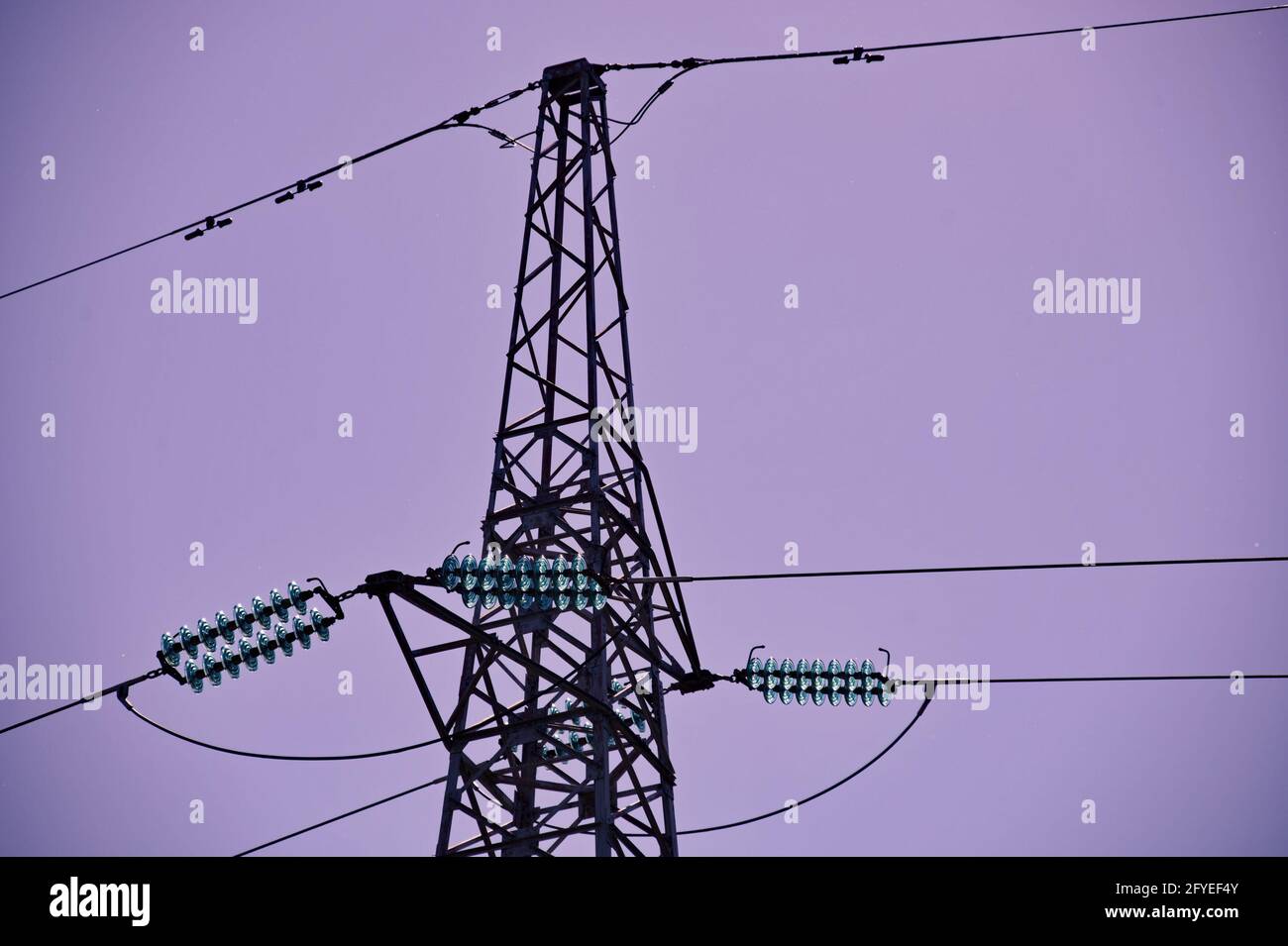 High voltage power tower against summer sky Stock Photo - Alamy