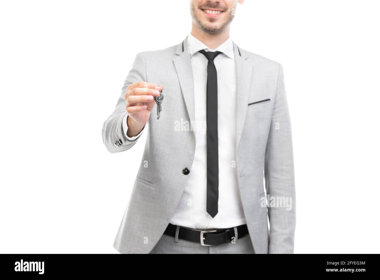 Horizontal medium portrait of handsome young adult Caucasian realtor ...