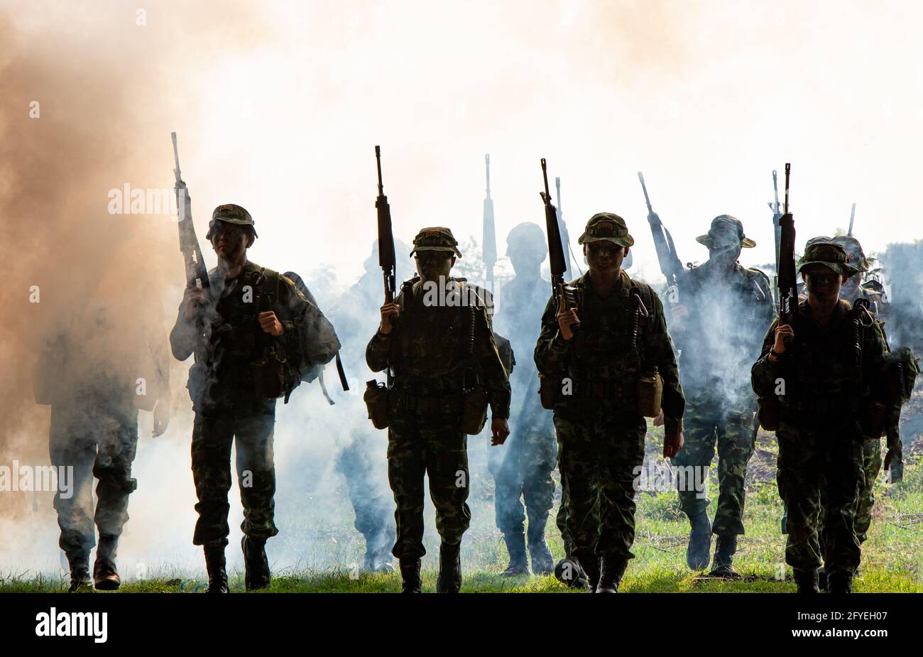 Surrounded by armed security soldiers hi-res stock photography and ...