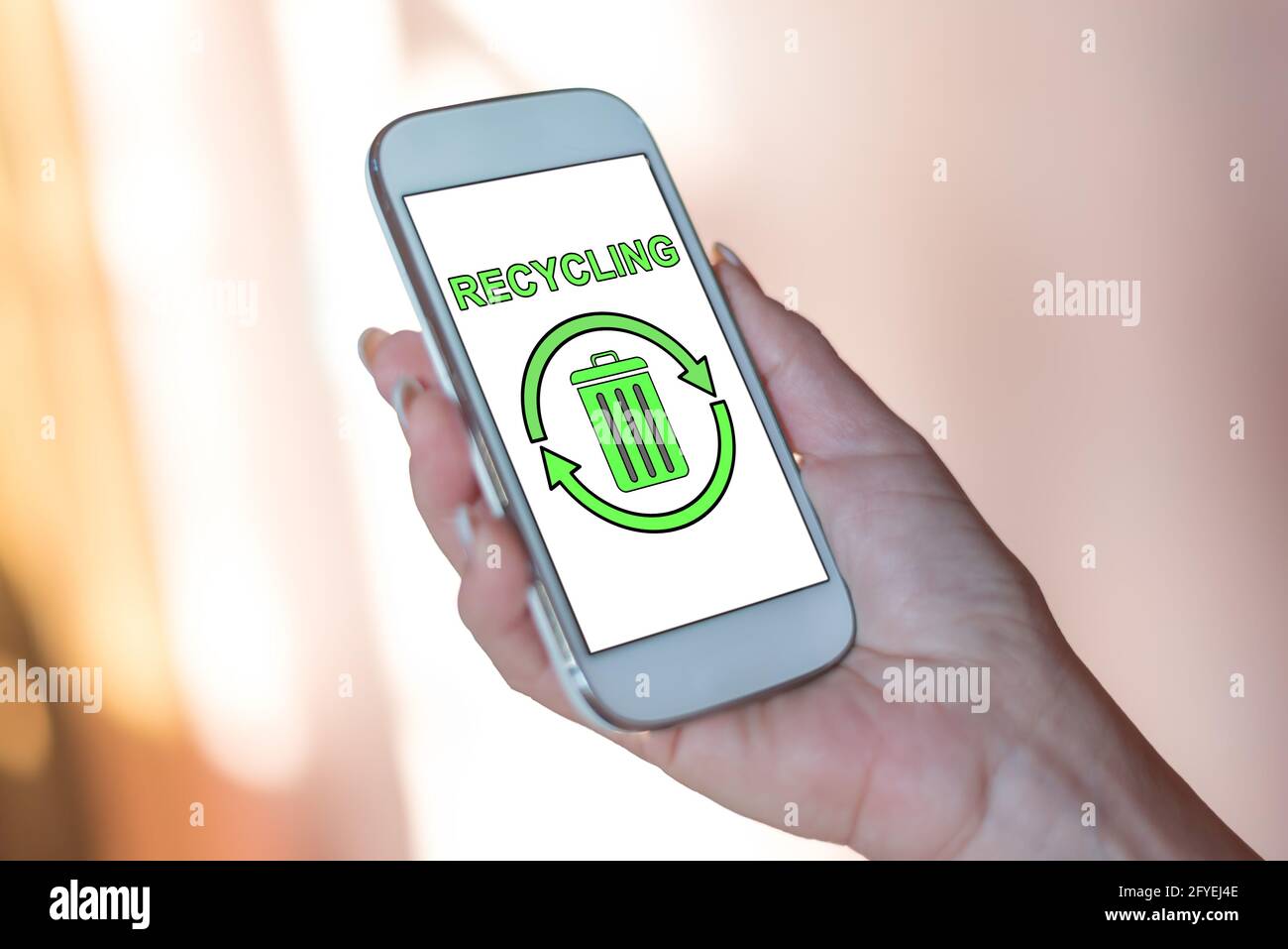 Smartphone screen displaying a recycling concept Stock Photo - Alamy